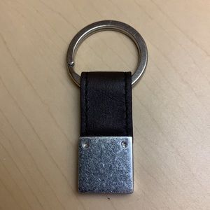 Lacoste | Accessories | Lacoste Metallic And Brown Leather Keychain ...